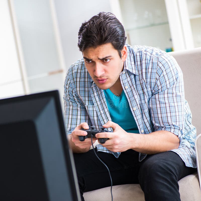 Man Playing Computer Game at Home Stock Photo - Image of monitor ...
