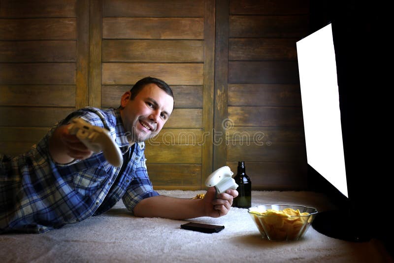 Man Playing on a Console on the Joystick before the Big TV Stock Image ...