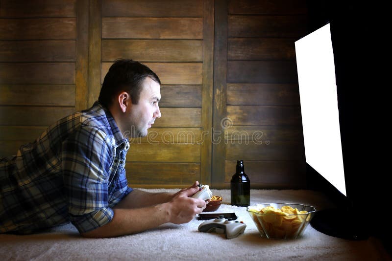 Man Playing on a Console on the Joystick before the Big TV Stock Image ...