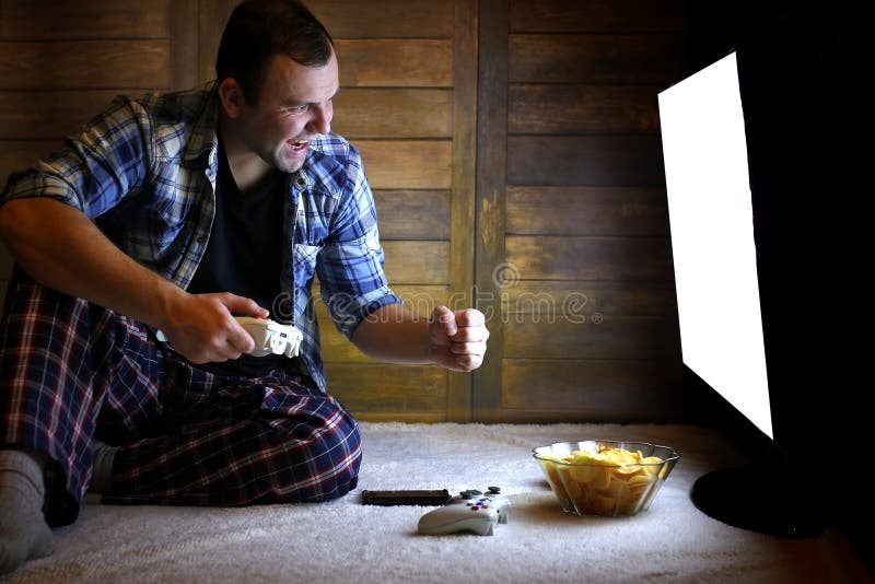 Man Playing on a Console on the Joystick before the Big TV Stock Image ...