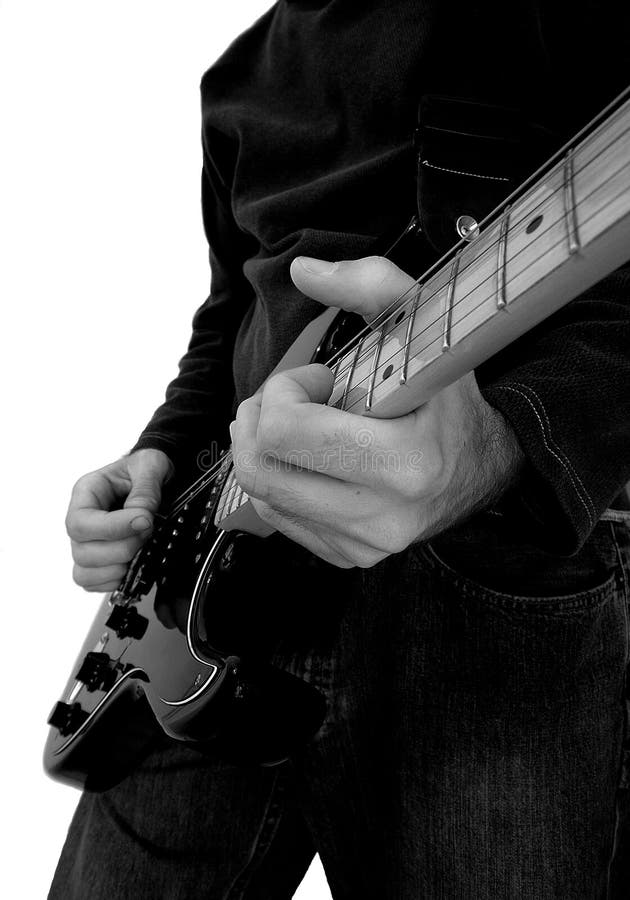 Man Playing Electric Guitar in the Shadow. Musical Instrument Photo ...