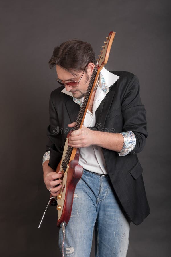 Man Playing Electric Guitar Stock Photo - Image of casual, string ...