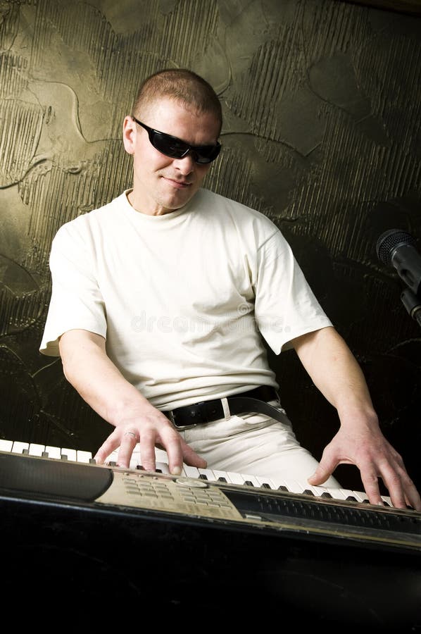 2+ Man playing electric keyboard Free Stock Photos - StockFreeImages
