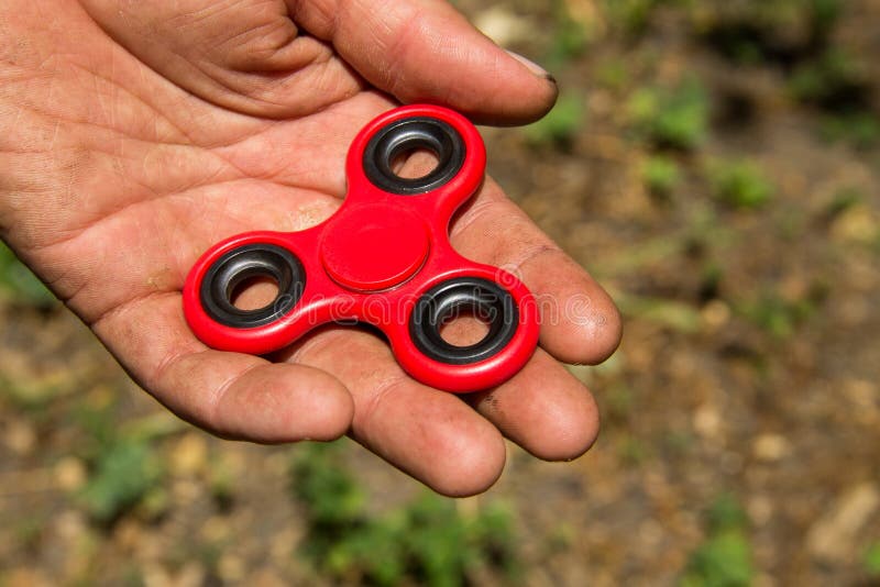 Man Playing with Fidget Spinner Stress Relieving Toy Stock Image ...