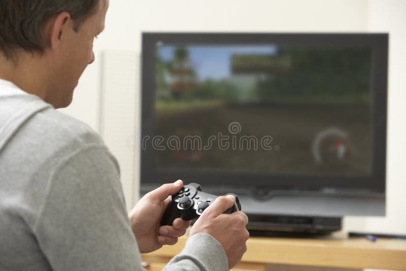 Man Playing with Game Console Stock Image - Image of back, home: 8688041