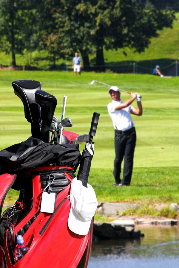 Man playing golf stock image. Image of hold, iron, golfer - 18719507