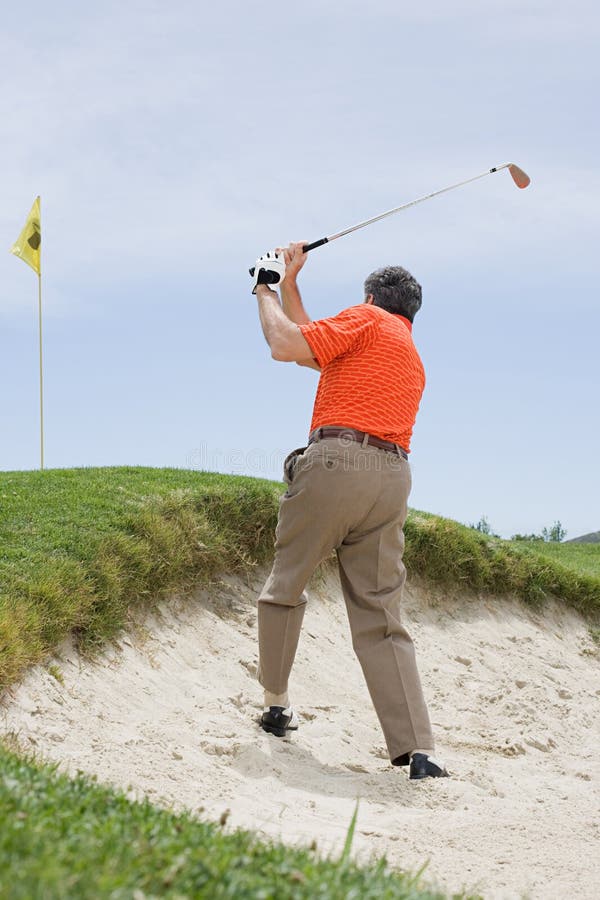 Man playing golf stock image. Image of enjoy, grass, bend - 62533787