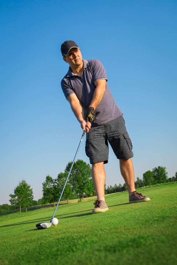 Man playing golf stock photo. Image of active, hobby - 43964764