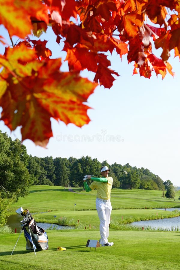 Man Playing Golf during Colorful Autumn Stock Image - Image of blue ...