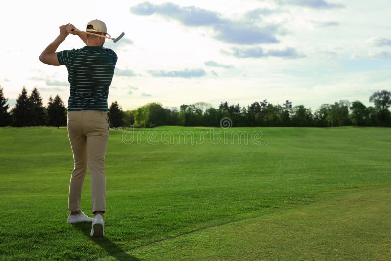Man Playing Golf on Green Course, Back View. Space for Text Stock Image ...