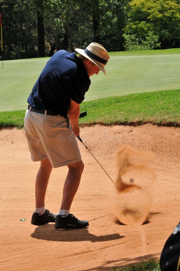 Man Playing Golf Shot Out of Sand Bunker on Green Stock Photo - Image ...
