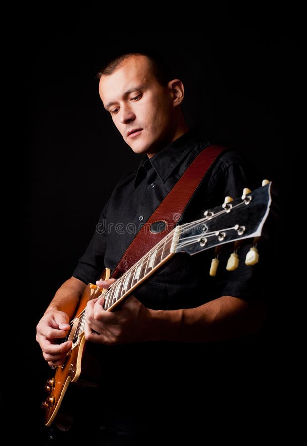 Man playing guitar stock photo. Image of black, fret - 21233670