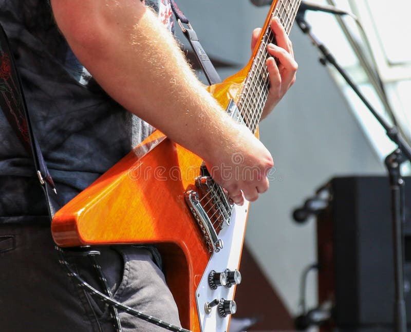 Man Playing Guitar in Front of Microphone Stock Photo - Image of ...
