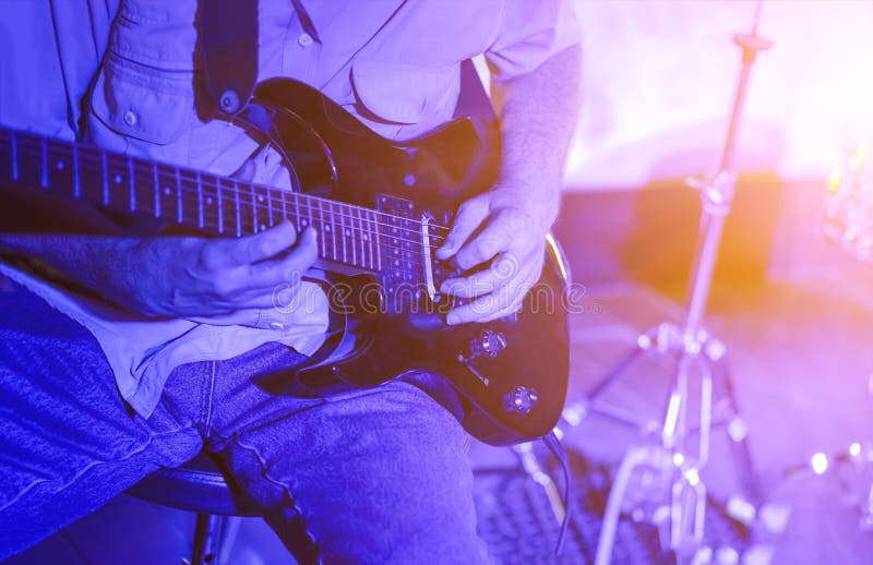 Man Playing the Guitar on Stage Closeup Stock Photo - Image of festival ...
