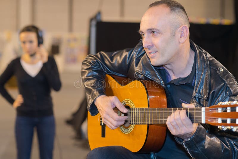 Man Playing Guitar on Stage Stock Photo - Image of song, rocker: 93906500