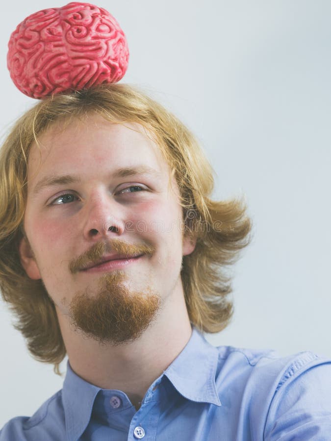 Man Playing with Human Brain Stock Photo - Image of ideas, symbol ...