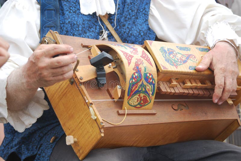 Man playing hurdy gurdy stock image. Image of plays, details - 16055049