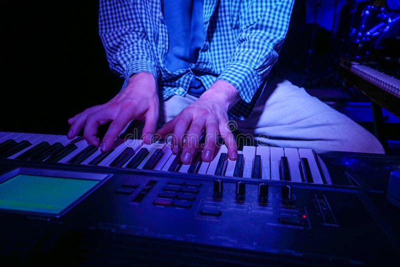 Man Playing the Keyboard stock photo. Image of person - 110034592