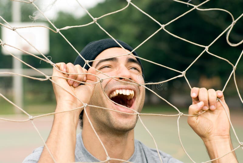 Man Playing with Net - Horizontal Stock Image - Image of happy ...
