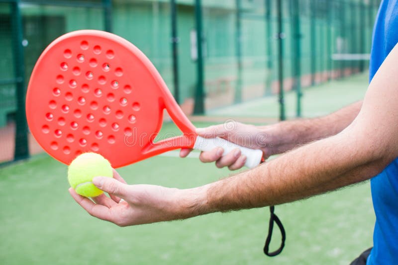 Man playing paddle tennis stock image. Image of adult - 51791261