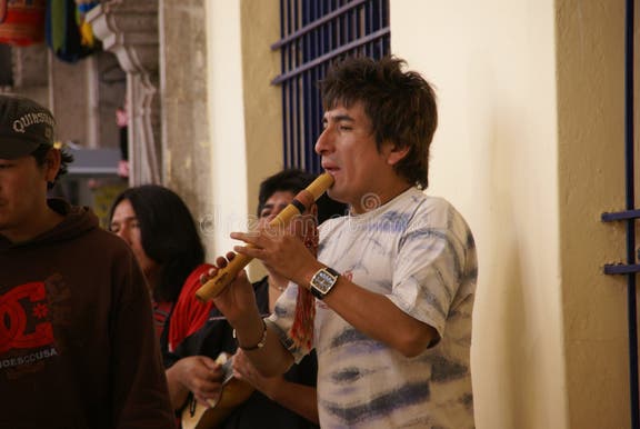 Man playing pan pipes editorial photography. Image of pipe - 25805622