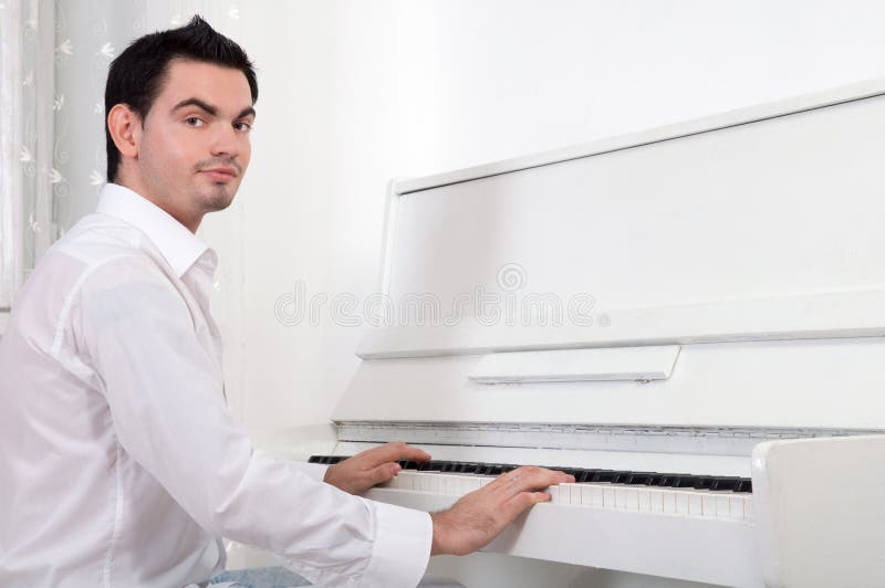 Man playing piano stock image. Image of adult, studio - 26844263