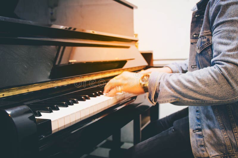 A man playing the piano. stock image. Image of caucasian - 101673385