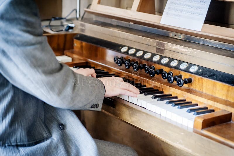 Man playing a Pipe Organ stock image. Image of artwork - 32068951