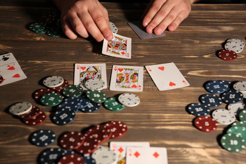 Bad Poker Gamble or Unlucky Hand Concept with Player Going All in with ...