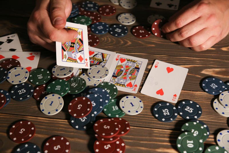 Bad Poker Gamble or Unlucky Hand Concept with Player Going All in with ...