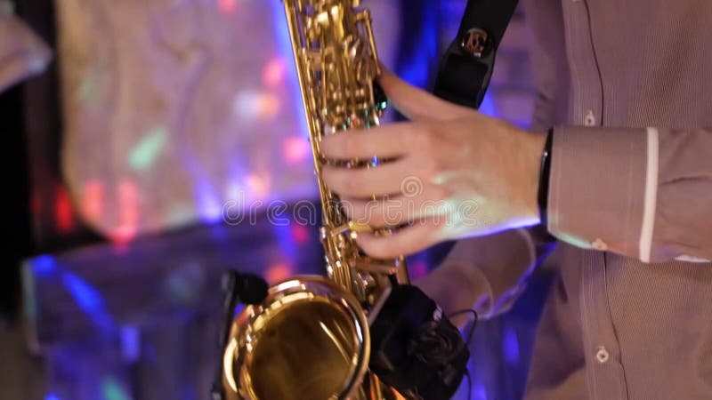 A Man Playing the Saxophone Stock Footage - Video of lights ...