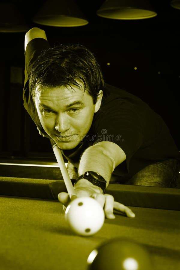 Man playing snooker. stock image. Image of competition - 27408543