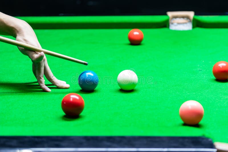A Man Playing Snooker in Bar. Snooker Player Aiming Snooker Ball on ...