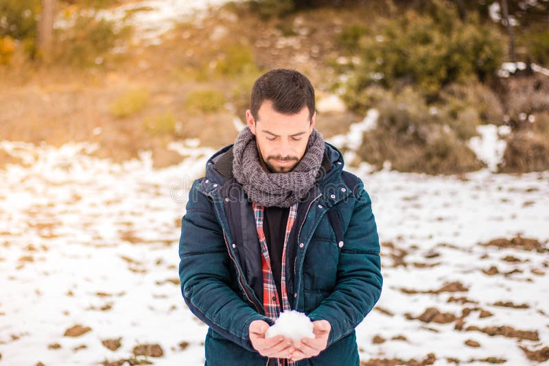 Man Playing with the Snow. Snowball Stock Image - Image of male ...