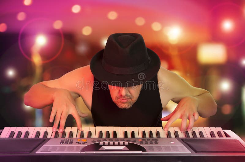 Man playing synthesizer stock photo. Image of classical - 61511932