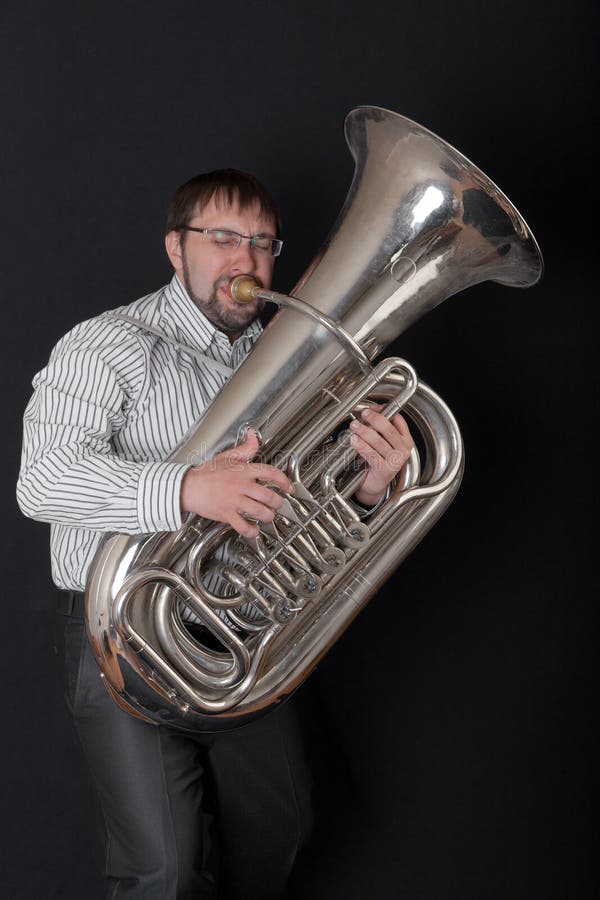 Man playing a tuba stock image. Image of male, musician - 21103765