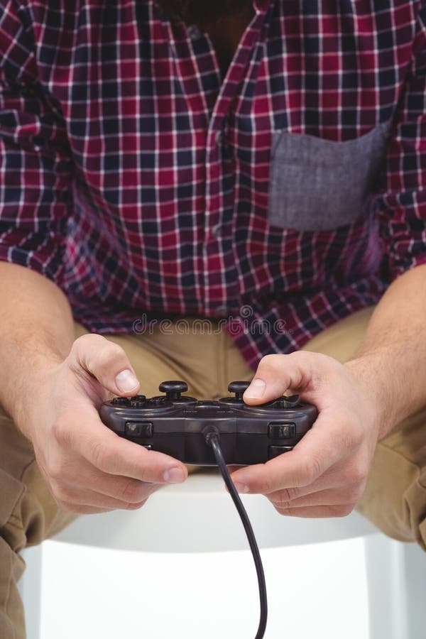 Man playing video game stock photo. Image of view, pressing - 60557078