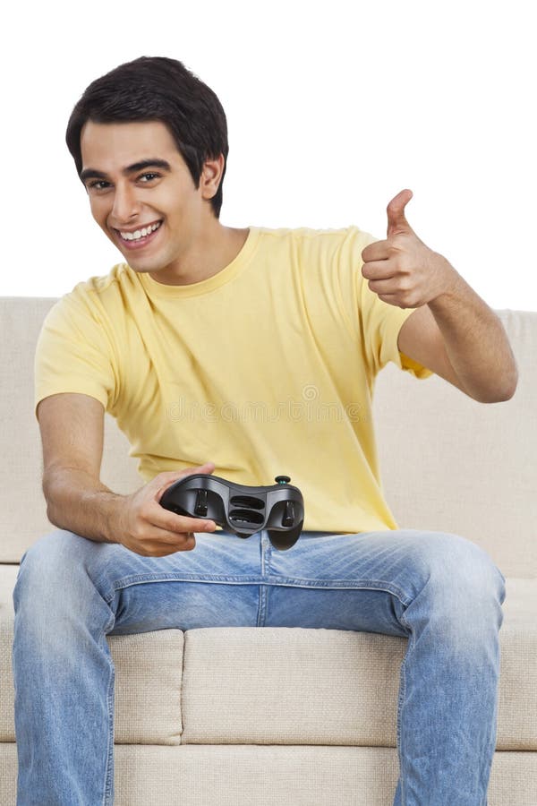 Man playing video game stock image. Image of jeans, game - 36376109