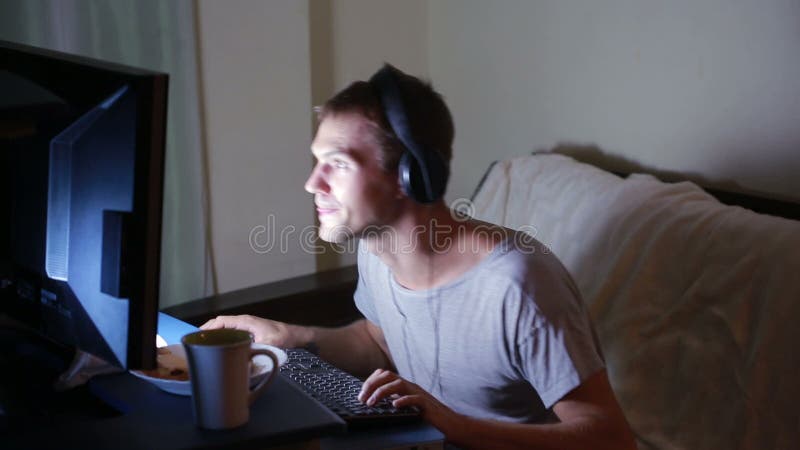 Man Playing Video Games on Your Computer. Late at Night on the Computer ...