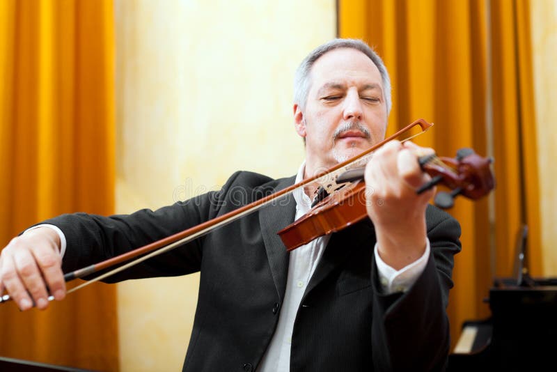 Man playing viola stock photo. Image of listen, playing - 39793416