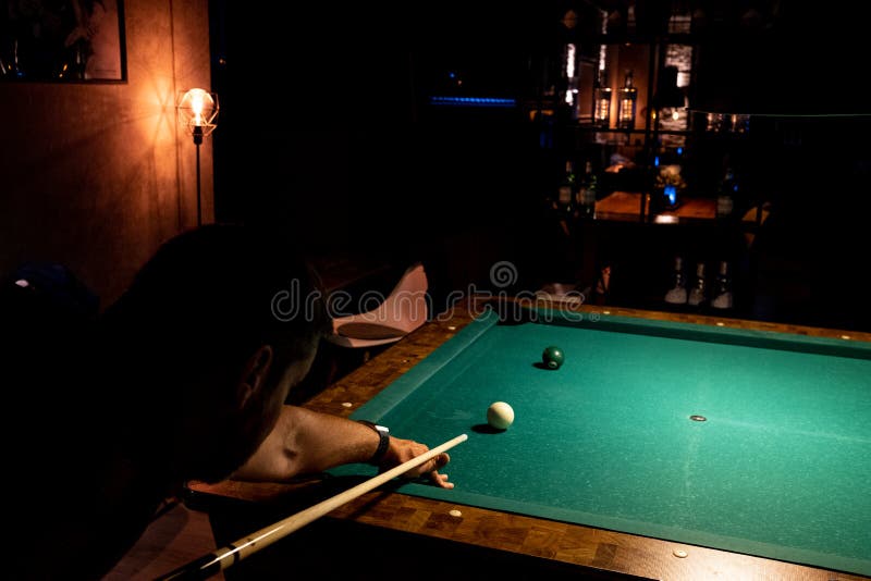 Man Plays Billiards on a Billiard Table Stock Image - Image of ...