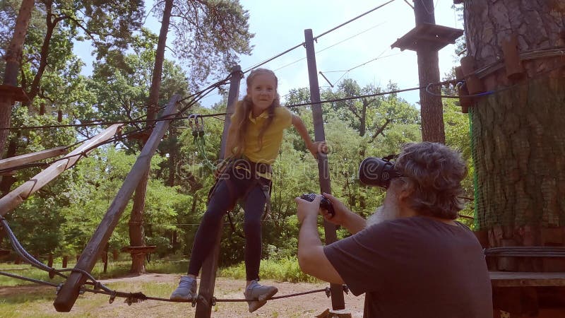 A Man Plays a Computer Game while Controlling a Child. Stock Footage ...