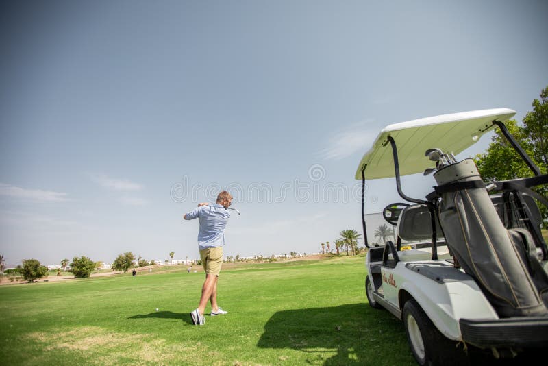 A Man Plays Golf and Has Fun Spending the Weekend Stock Photo - Image ...