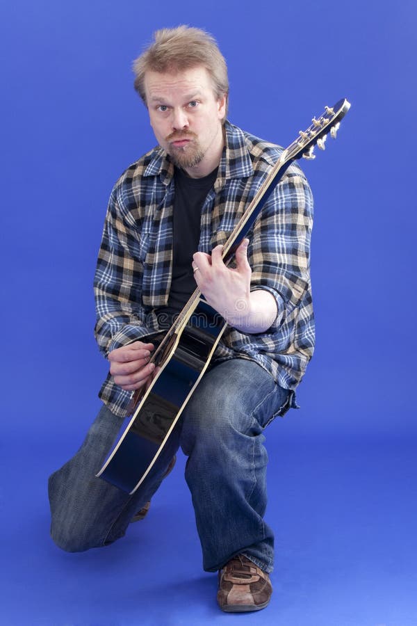 Man is Smashing His Guitar on the Floor Stock Photo - Image of acoustic ...