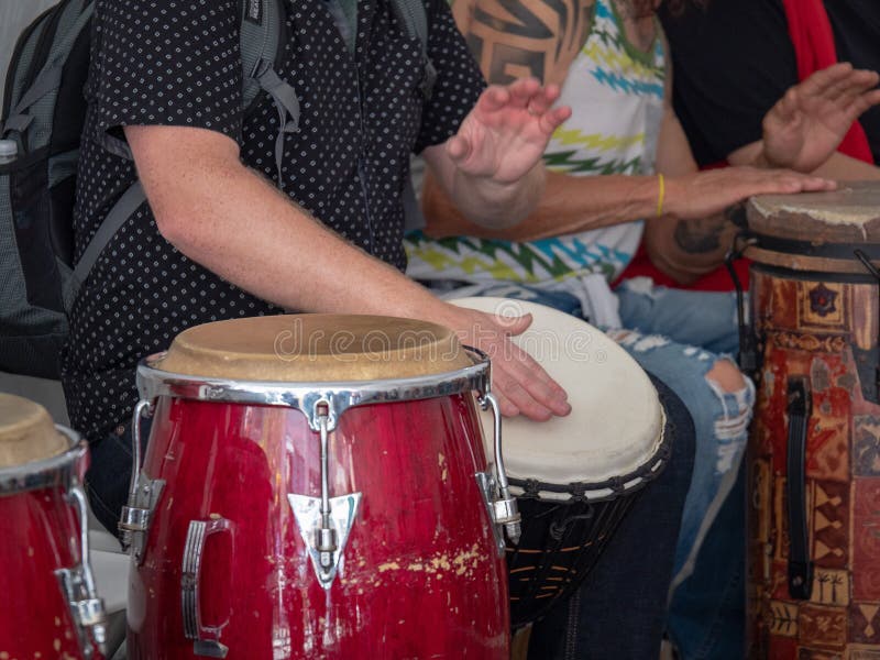 Man Plays Mexican Conga Drums Amongst Others Playing Along Stock Photo ...