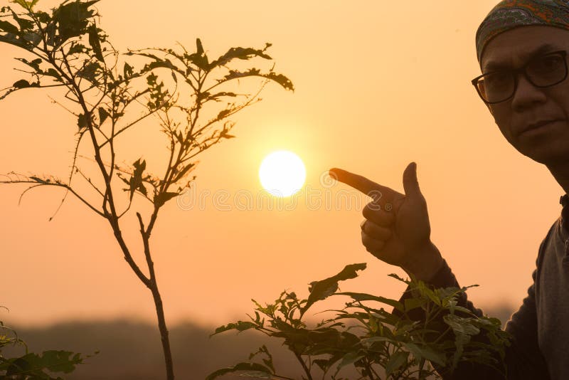 Man Point Finger To the Sun Stock Photo - Image of view, point: 92712320