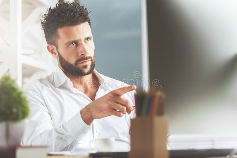 Man pointing at computer stock photo. Image of entrepreneur - 87212964