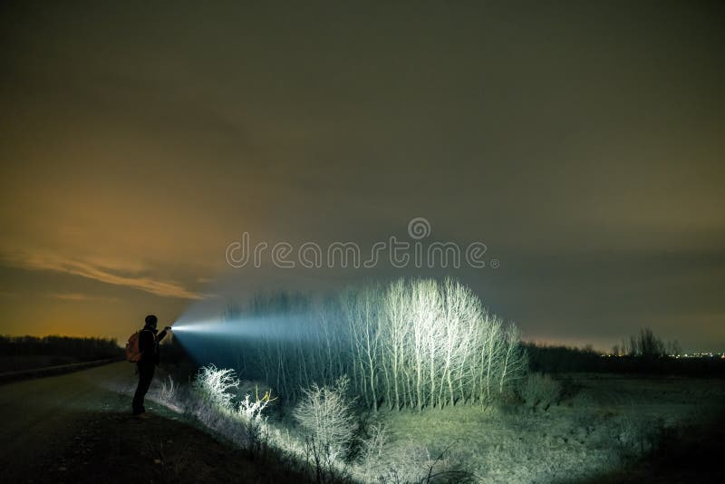 Man with Flashlight in Outdoor at Night Stock Photo - Image of ...