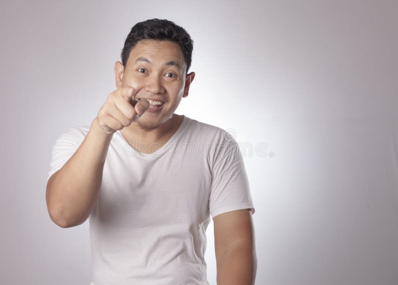 Man Pointing Forward, Looking at Camera Stock Image - Image of ...