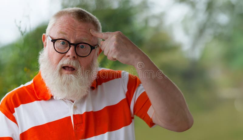 Man Pointing at His Forehead with a Finger Stock Photo - Image of white ...